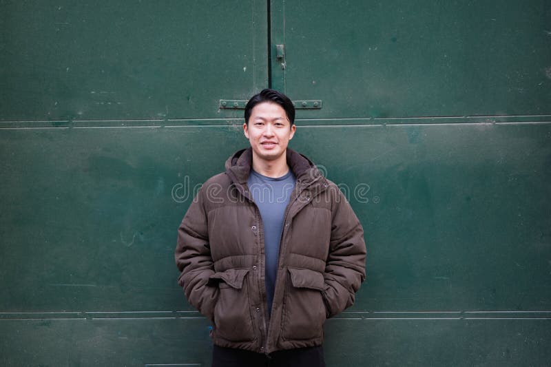 Portrait of Young Handsome Asian Man Outdoors during Cold Day. Stock ...