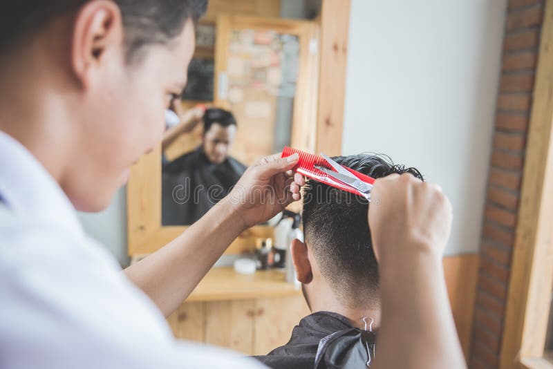 Young Barber Expert Smiling Welcoming Customer To His Barbershop Stock ... Young Barber Expert Smiling Welcoming Customer To His Barbershop Stock ...