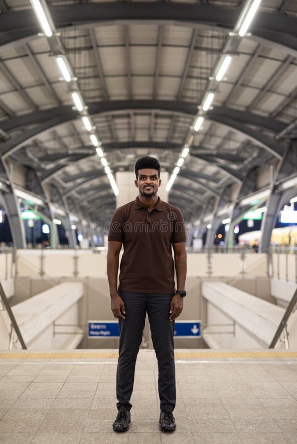 Portrait of Handsome Black Man at Train Station during Night Stock ...