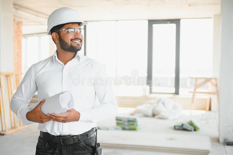 Portrait of a Civil Engineer, Architect Against the Background of a ... Portrait of a Civil Engineer, Architect Against the Background of a ...