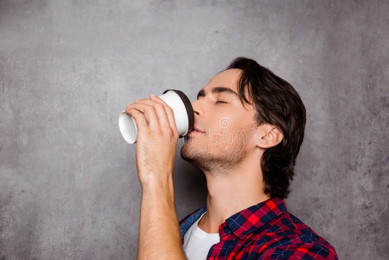 Portrait of Young Handsome Man Drinking Coffee on Gray Background Stock ... Portrait of Young Handsome Man Drinking Coffee on Gray Background Stock ...