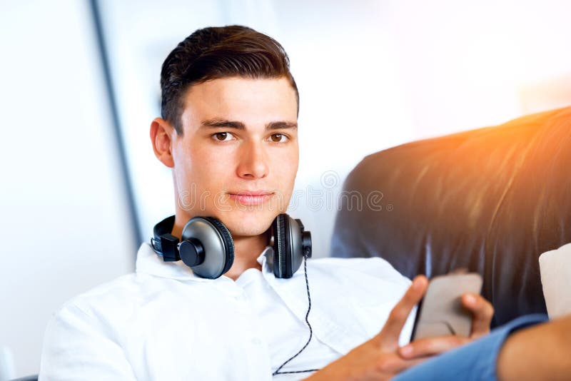 Portrait of Young Man Holding Phone Stock Photo - Image of calling ... Portrait of Young Man Holding Phone Stock Photo - Image of calling ...
