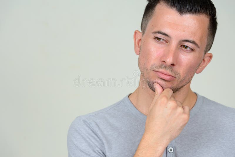 Portrait of Young Handsome Man Thinking and Looking Down Stock Image ...