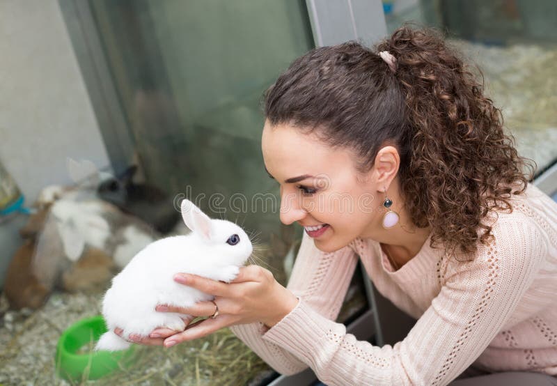 Portrait of Young Happy Girl Holding Rabbit Stock Photo - Image of ...