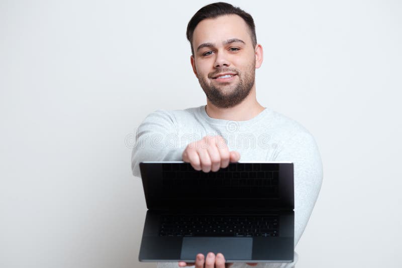 Portrait of Young Happy Man Opening Laptop Over White Background Stock ... Portrait of Young Happy Man Opening Laptop Over White Background Stock ...