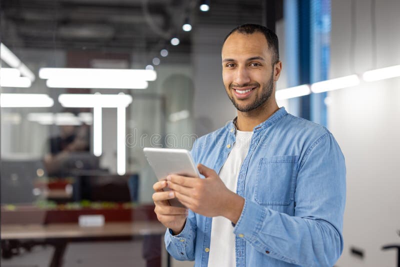 Portrait of a Young Hispanic Engineer Engineer Standing in a Modern ...