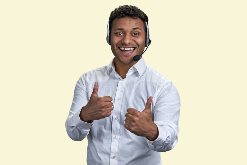 Portrait of a Young Indian Customer Support Worker Wearing Headset ...