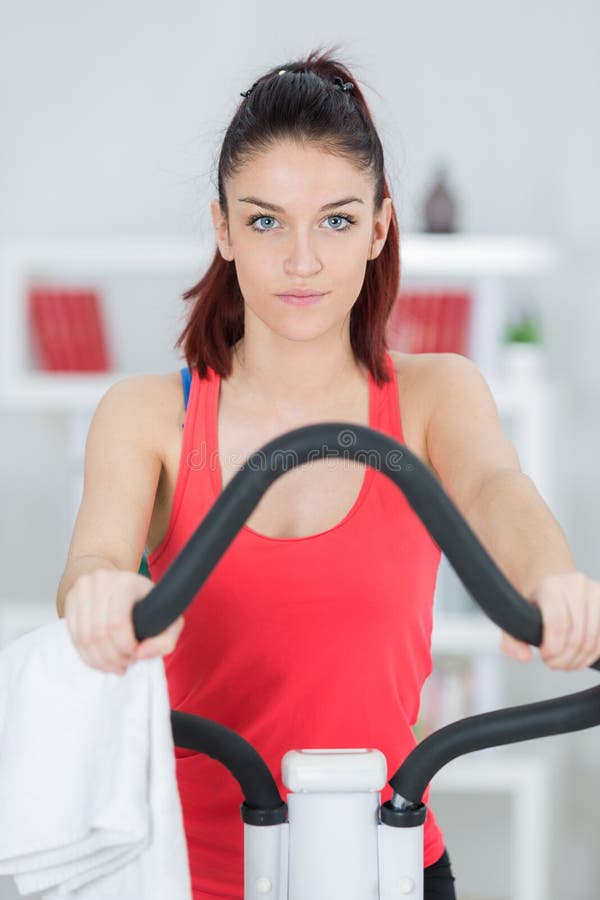 Portrait Young Lady on Exercise Machine Stock Image - Image of exercise ...
