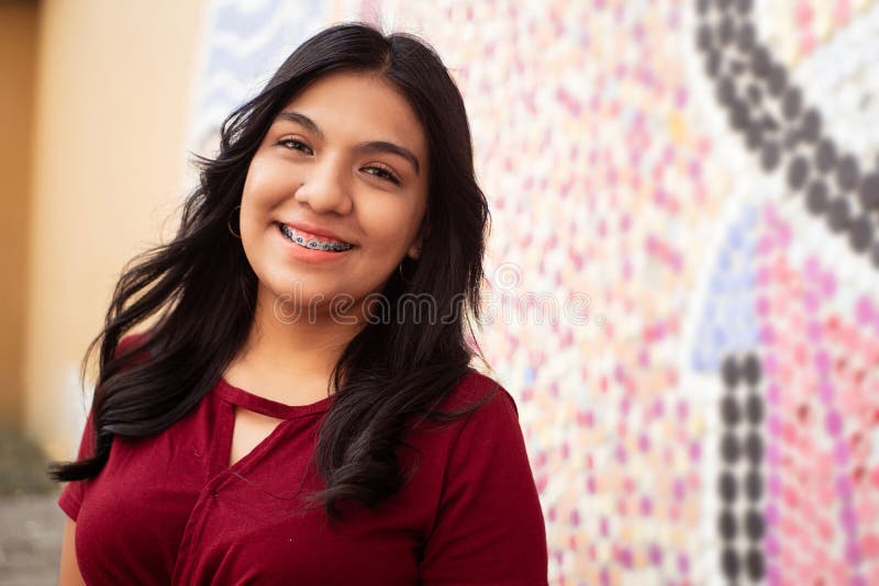 Portrait of a Young Latin Female Smiling with Brackets Stock Image ...