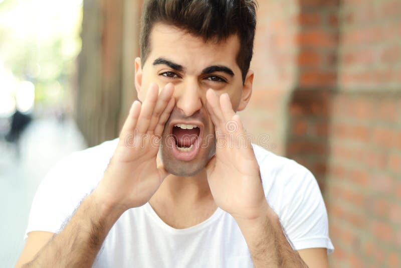 Man shouting at camera. stock photo. Image of fashion - 124617960