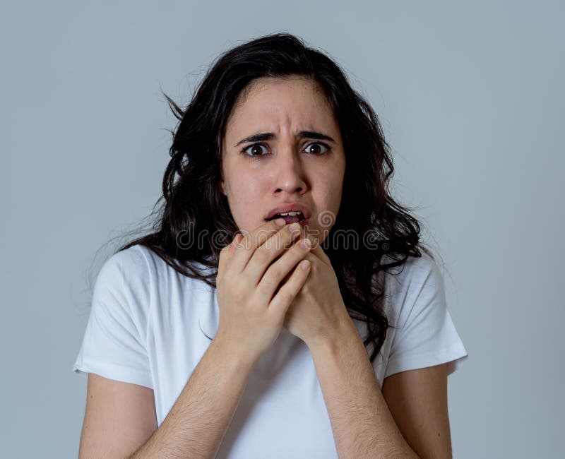 Portrait Of A Young Attractive Woman Looking Scared And Shocked Human