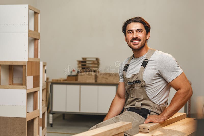 Portrait of Young Male Carpenter Standing in the Wood Workshop Stock ...