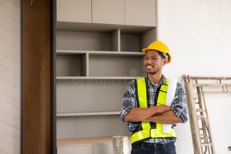 Portrait of Young Male Engineer Contractor in Work Clothes Standing at ...