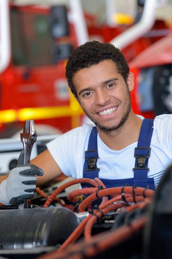 Portrait Young Male Fire Service Mechanic Stock Image - Image of posing ...