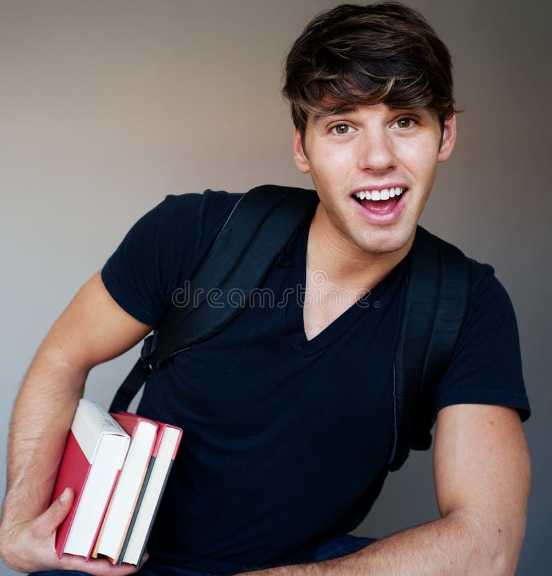 Portrait of a Young Male Student with Books Stock Photo - Image of ...