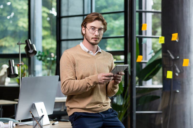 Portrait of a Young Male Student, Intern Standing in the Office, Co ...