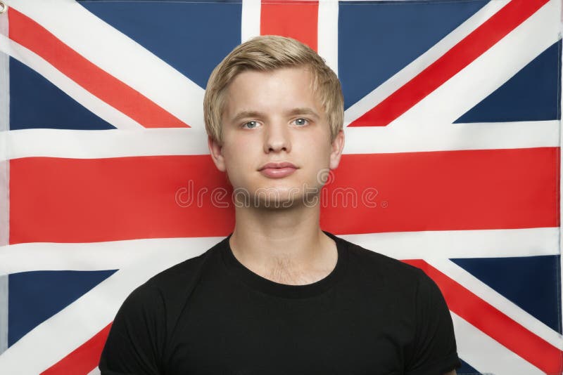 Portrait of Young Man Against British Flag Stock Image - Image of ...