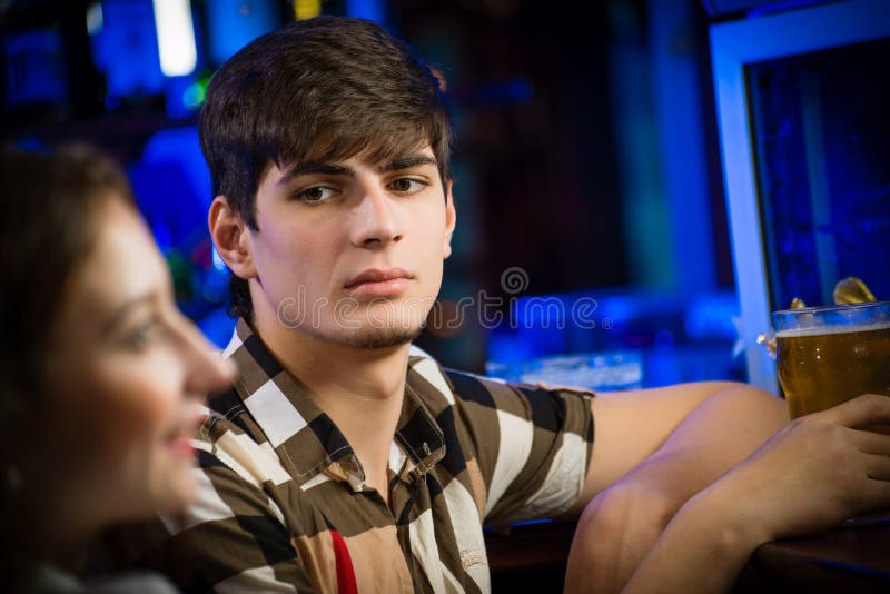 Portrait of a Young Man at the Bar Stock Photo - Image of hand ...