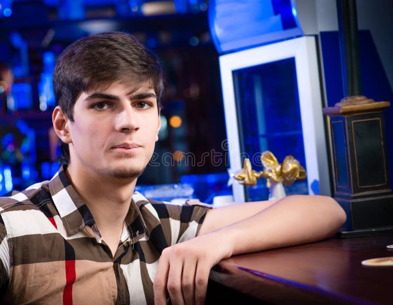 Portrait of a Young Man at the Bar Stock Image - Image of beverage ...