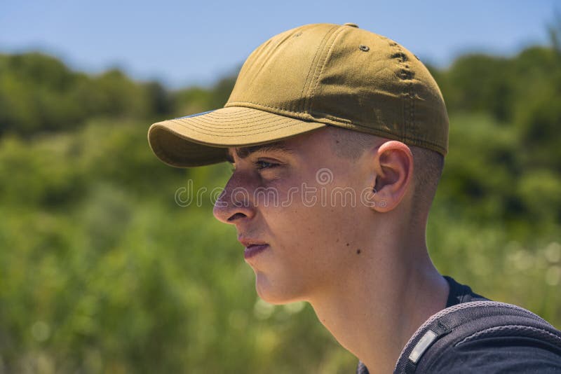 Profile of a Young Boy with Base Cap Stock Photo - Image of blue, color ...