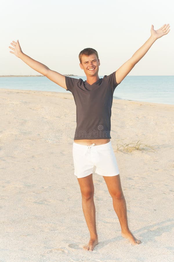 Portrait of a Young Man on the Beach Stock Image - Image of attractive ...