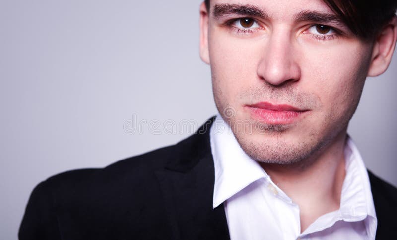Portrait of a Handsome Young Man on Gray Background Stock Photo - Image ...