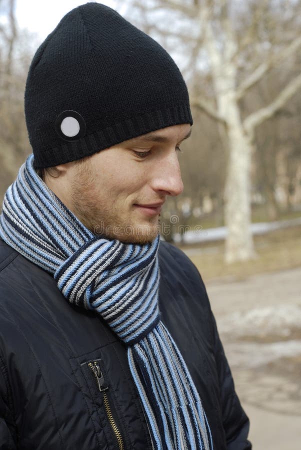 Portrait of Young Man in Black Cap and Scarf Stock Photo - Image of ...