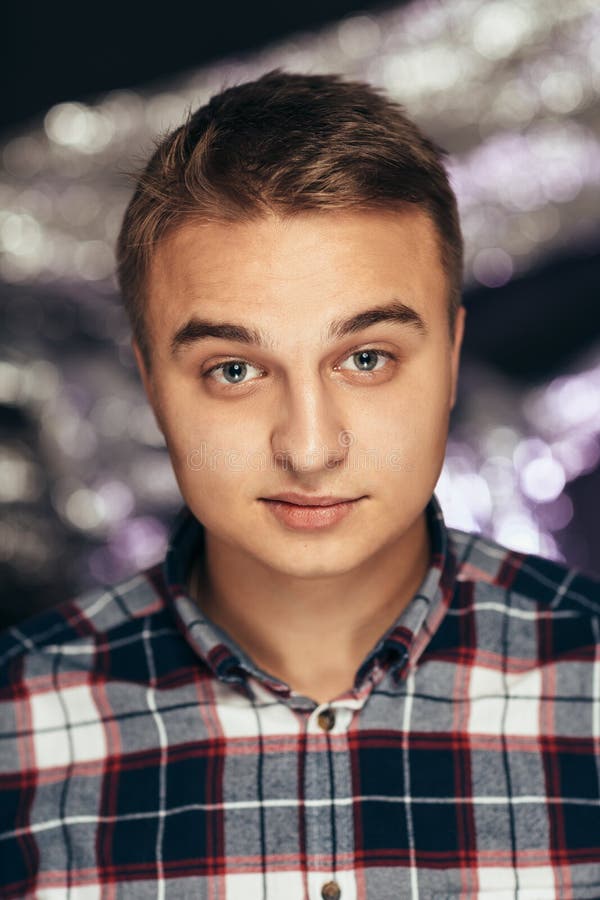 Portrait Of A Young Man On A Blurred Background Stock Photo - Image of ... Portrait Of A Young Man On A Blurred Background Stock Photo - Image of ...