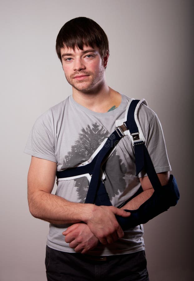 Portrait of Young Man with Broken Hand Stock Photo - Image of adult ...