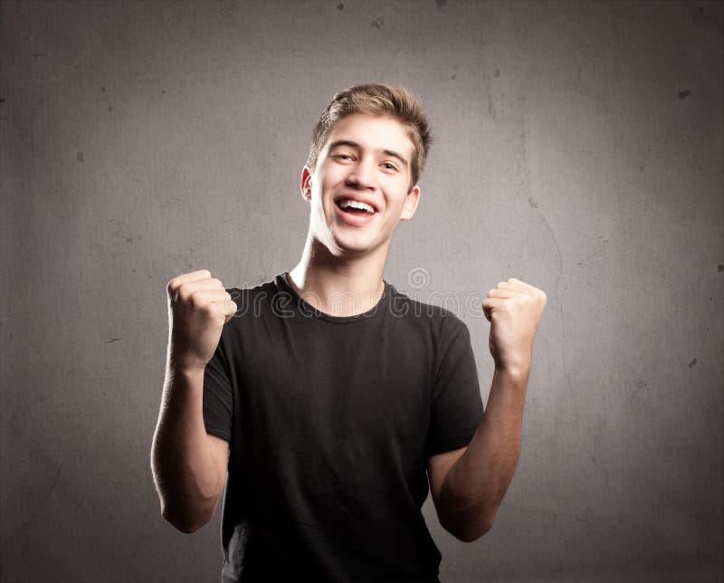 Young man celebrating stock image. Image of male, expression - 108110223