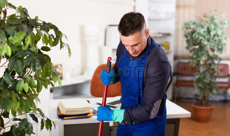 Young Man Cleaner Working at Office Stock Photo - Image of chores ...