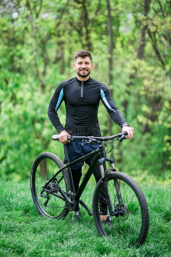 Portrait of Young Man with Cycle in Summer Green Park Stock Image ...