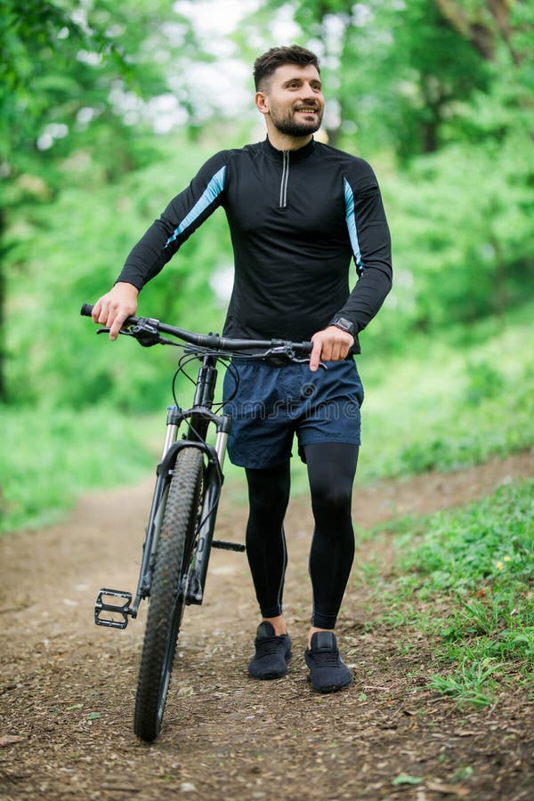 Portrait of Young Man with Cycle in Summer Green Park Stock Photo ...
