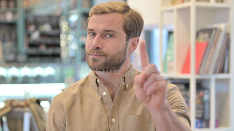 Portrait of Young Man Disapproving with Finger Stock Photo - Image of ...