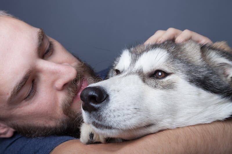 Portrait of a Young Man with a Dog Stock Image - Image of candid, ideas ...