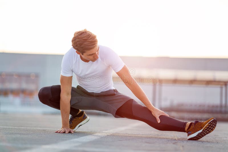 Young Man Exercising Outdoors Stock Image - Image of athlete ...