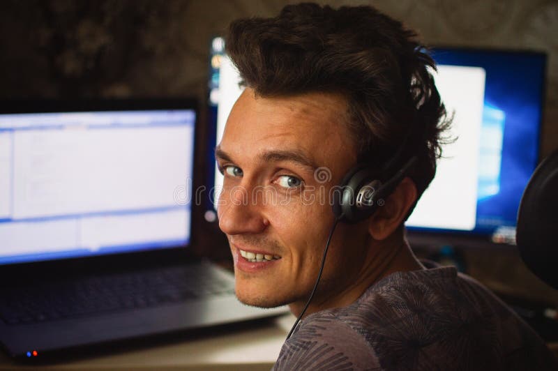 Portrait Young Man Headphones Working Two Computers Home Stock Photos ...