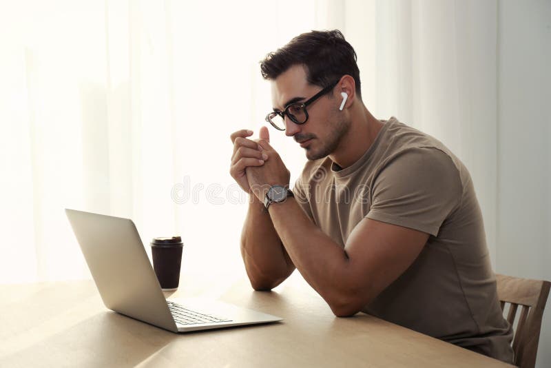Portrait of Young Man with Laptop at Table Stock Image - Image of ...