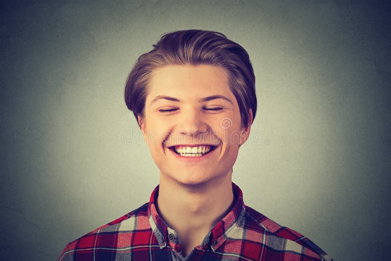 Portrait of a Young Man Laughing Stock Image - Image of happy, wall ...
