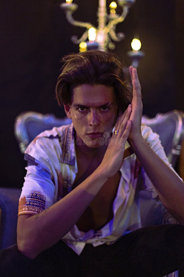 Young Man Looking at Camera Inside a Nightclub Stock Image - Image of ...