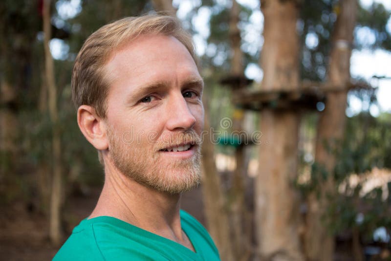 Young Man Looking into Camera and Standing in the Forest Stock Image ...