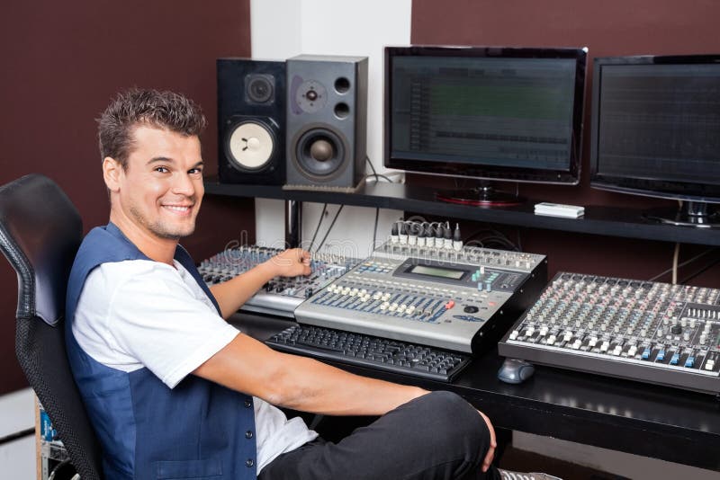 Portrait of Young Man Mixing Audio in Recording Studio Stock Image ...