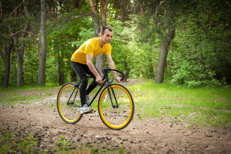 Portrait of a Young Man Moving on a Bicycle Stock Image - Image of ...