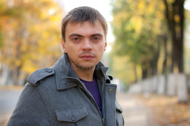 Portrait of Young Man with Piercing Eyes Stock Photo - Image of ...