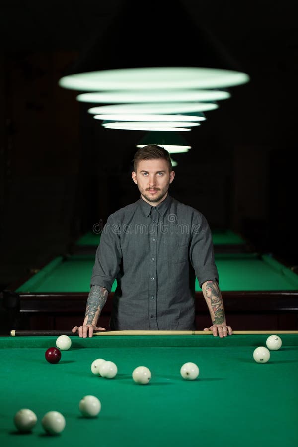 Portrait of a Young Man Playing Snooker. Stock Photo - Image of ...