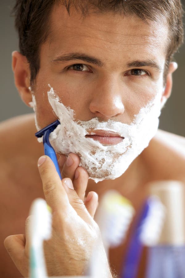 Portrait of Young Man Shaving Stock Image - Image of hygiene, head ...
