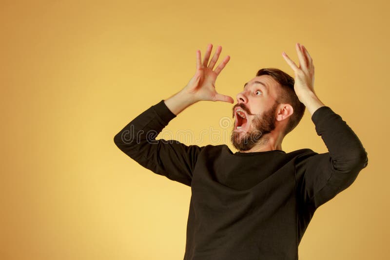 Portrait of Young Man with Shocked Facial Expression Stock Photo ...