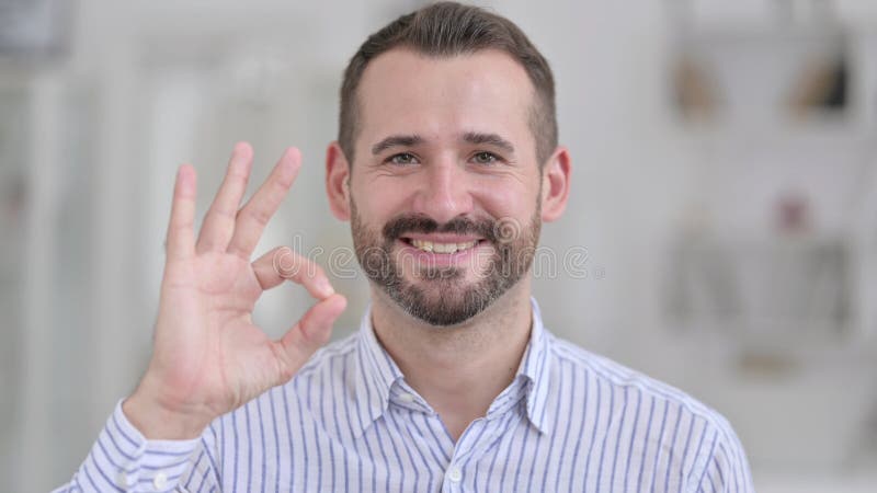 Portrait of Young Man Showing Okay Sign by Hand Stock Image - Image of ...