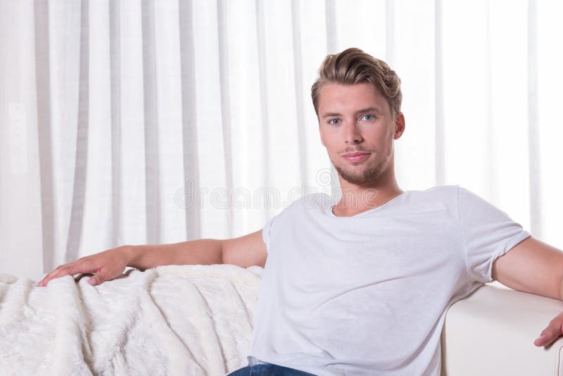Portrait Young Man Sitting on Couch Stock Image - Image of hair, self ...
