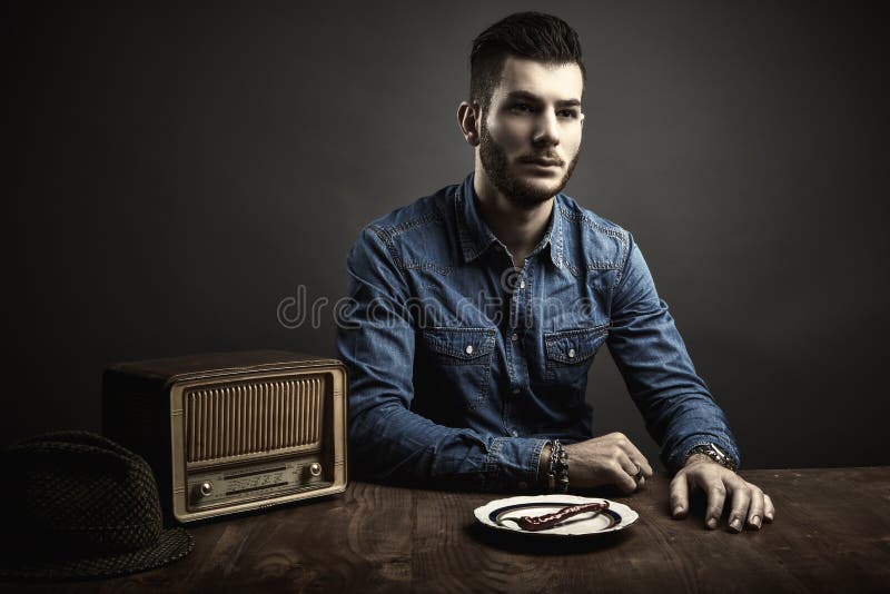 Portrait of Young Man Sitting at a Table, Vintage Style Stock Image ...